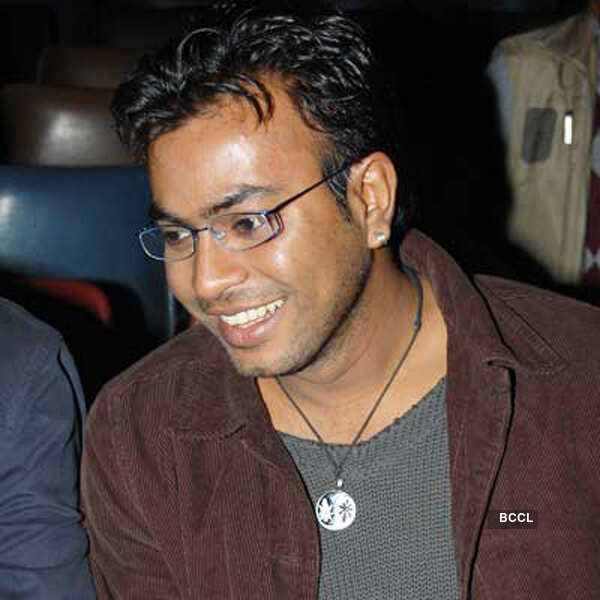 Rudranil Ghosh poses for the shutterbugs during a bash.