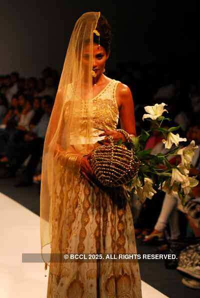 A model showcases a creation of fashion designer Anjana during 'India Fashion Week' in New Delhi ...