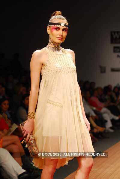 Model Noyonika Chatterjee looks stunning in this red hot outfit from ...