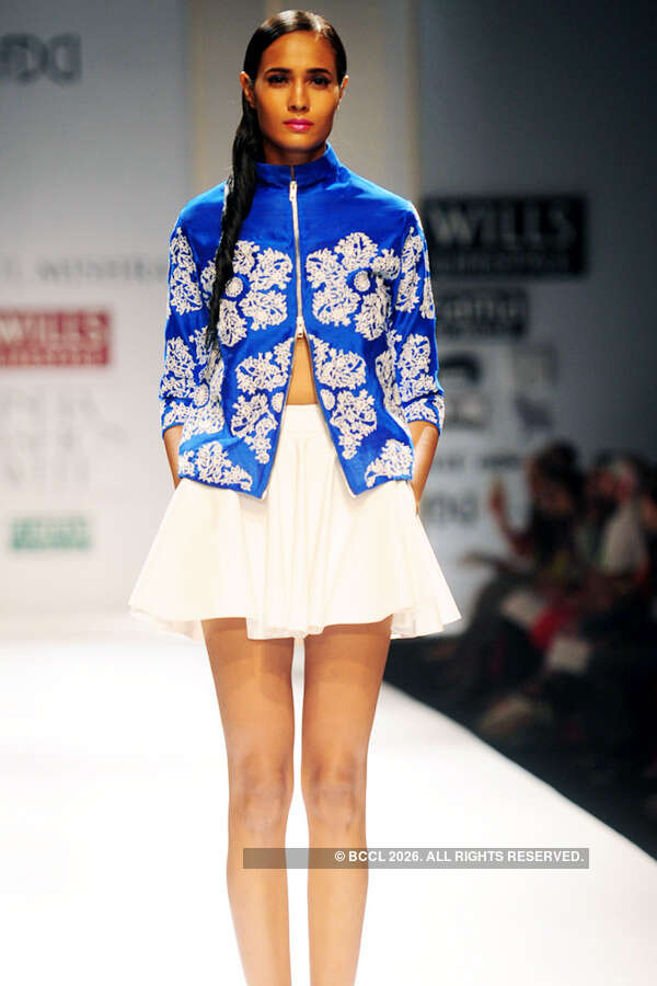 A model walks the ramp for fashion designer Rahul Mishra on Day 2 of ...