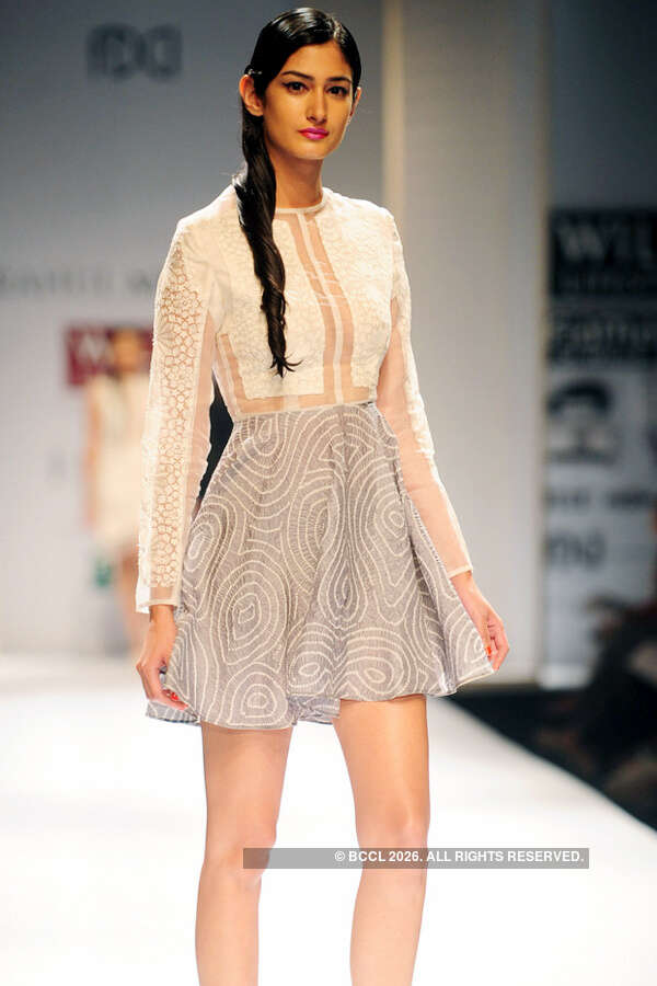 A model walks the ramp for fashion designer Rahul Mishra on Day 2 of ...