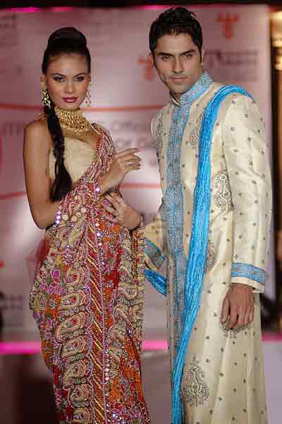 Models pose together during the Jewellery show held recently in Delhi ...