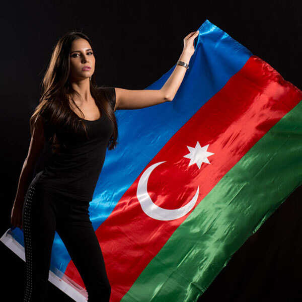 Miss Universe contestants pose with their national flags