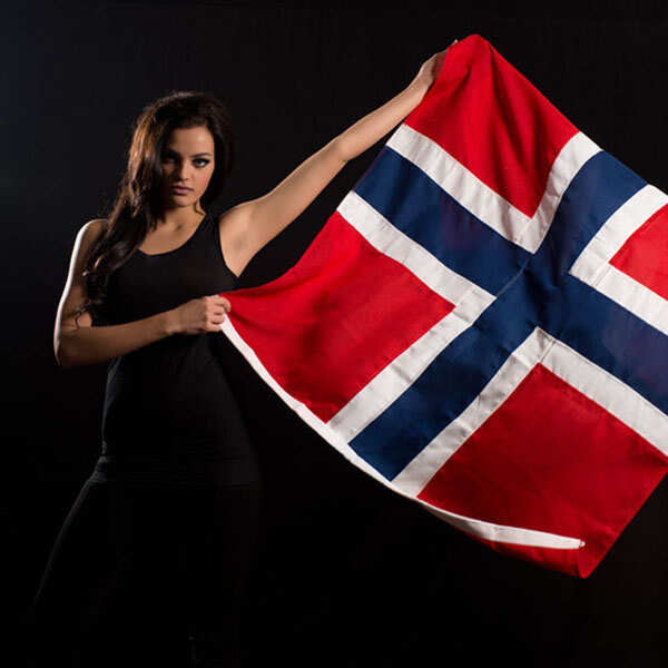 Miss Universe contestants pose with their national flags