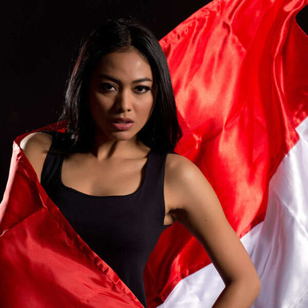 Miss Universe contestants pose with their national flags