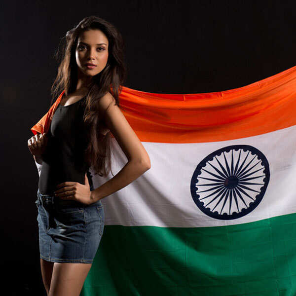 Miss Universe contestants pose with their national flags