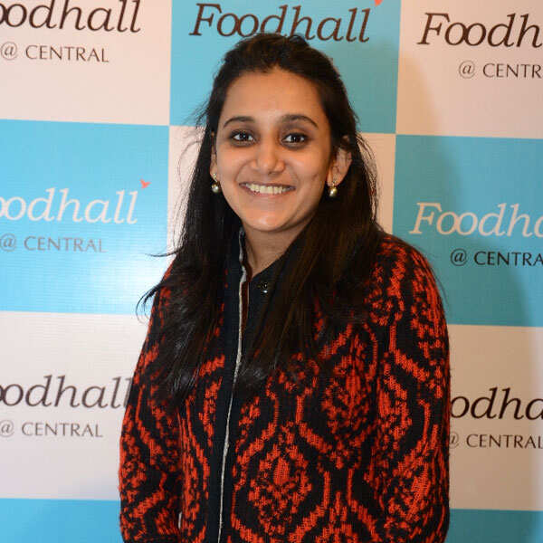 Avni Biyani smiles for the lens as she arrives for the launch of a new ...