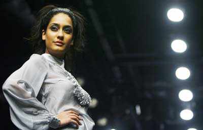 Esha Gupta showcases an outfit from designer Gayatri Khanna's fall ...