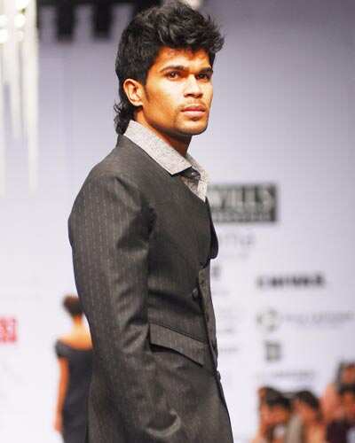 A model displays an outfit from designer Gaurav Gupta's fall/winter ...