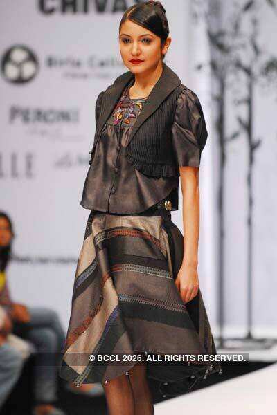 Sampada Inamdar displays an outfit from designer Niki Mahajan's fall ...
