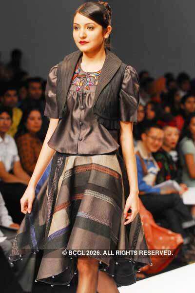 Sampada Inamdar displays an outfit from designer Niki Mahajan's fall ...