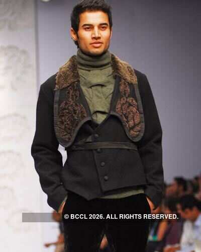 Esha Gupta displays an outfit from designer Varun Bahl's fall/winter collection being showcased ...