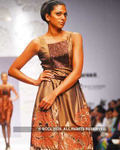 Joey Mathew displays an outfit from designer Varun Bahl's fall/winter collection being showcased ...