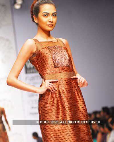 A model displays an outfit from designer Varun Bahl's fall/winter collection being showcased on ...