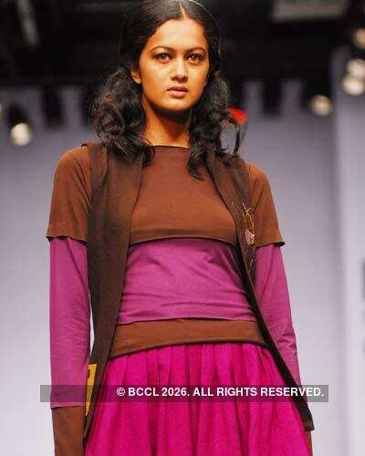 Tina Chatwal displays an outfit from designer Rahul Reddy’s fall/winter ...