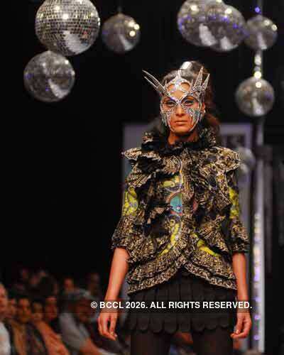 Michelle Innes displays an outfit from designer Manish Arora's fall ...