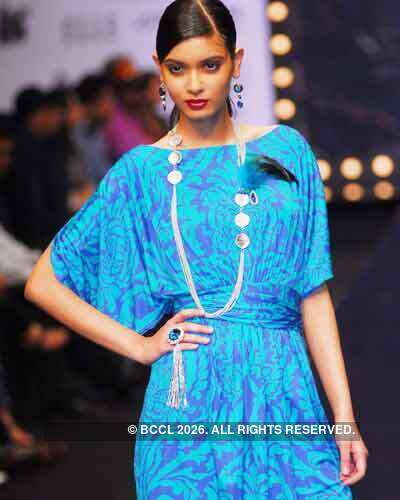 Poonam Nath displays an outfit from designers Ashima and Leena's fall ...