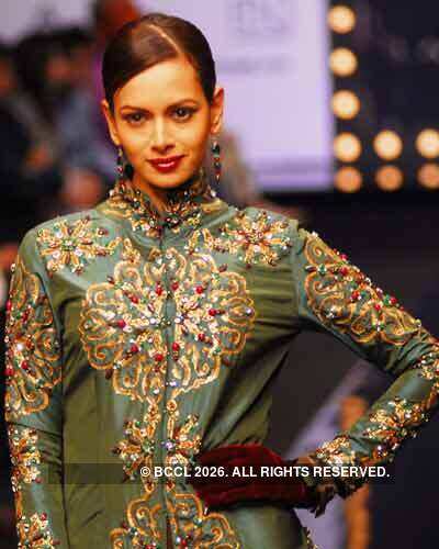 Poonam Nath displays an outfit from designers Ashima and Leena's fall ...