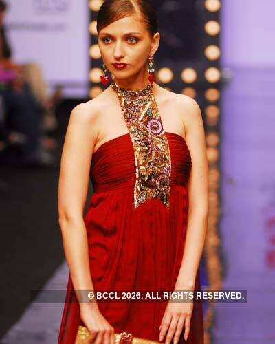 Poonam Nath displays an outfit from designers Ashima and Leena's fall ...