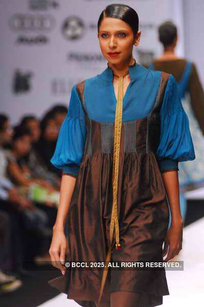 Donna Maish displays an outfit from designer Priyadarshini Rao's fall ...