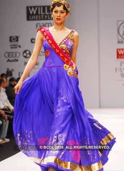 Michelle Innes displays an outfit from designer Rehane's fall/winter ...