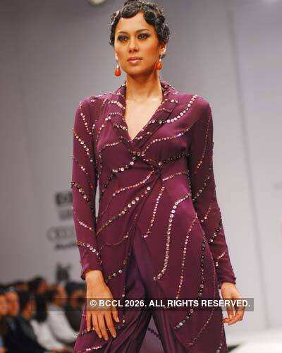 A model presents a creation from designer Manav Gangwani's Autumn ...