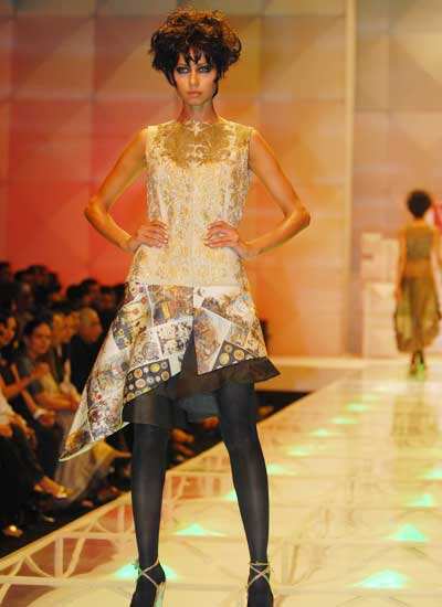 Models display outfits from designers Anamika Khanna and Ashish Soni's ...