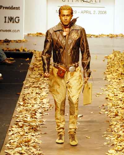A model displays an outfit from Arjun Khanna's autumn/winter collection ...
