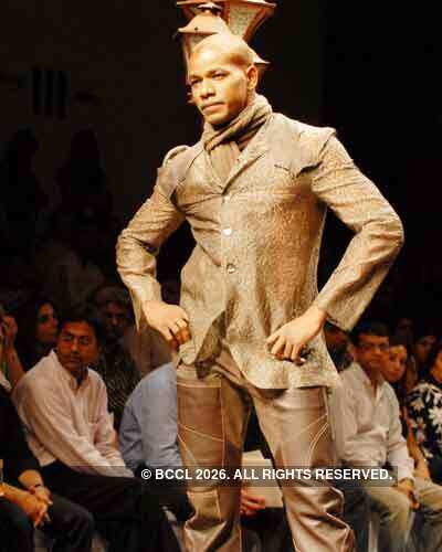 A model displays an outfit from Arjun Khanna's autumn/winter collection ...