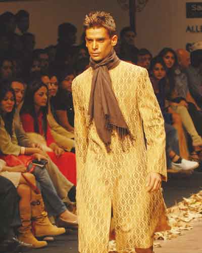 A model displays an outfit from Arjun Khanna's autumn/winter collection ...