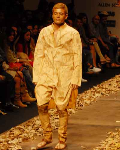 A model displays an outfit from Arjun Khanna's autumn/winter collection ...