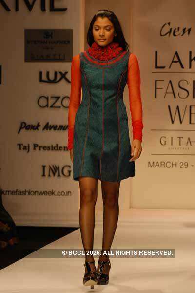 A model displays an outfit of designer's from Gen Next Fashion Show at ...