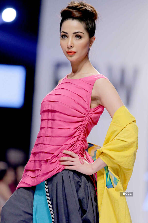 A Pakistani model presents a creation by HSY during the day one of ...