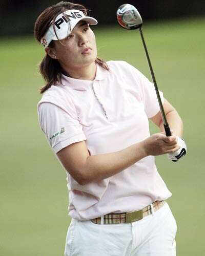 Yu Ping Lin of Taiwan watches her approach shot to the 9th hole during ...