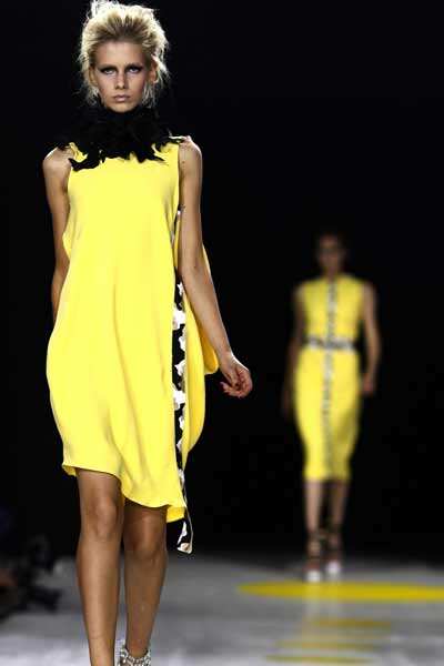 A model wears a creation by Giles during his spring/summer 2009 show at ...