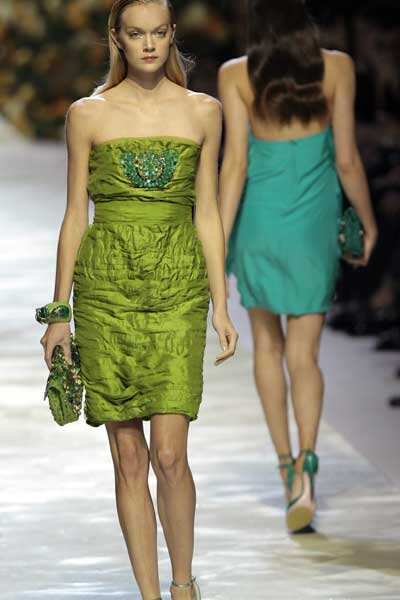 Plunging down: A model displays a creation as part of Blumarine Spring ...