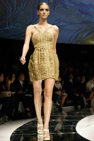 A model presents a creation for Italian fashion house Versace as part ...