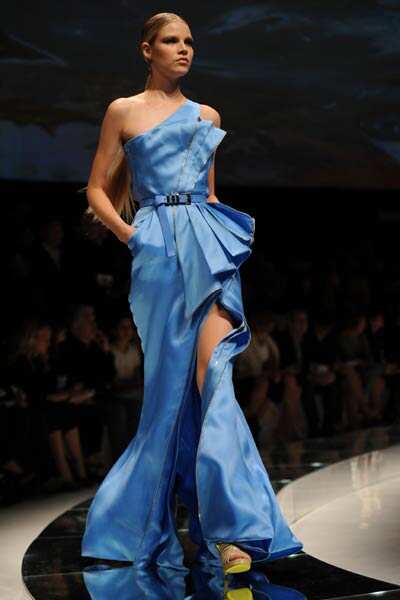 model presents a creation for Italian fashion house Versace as part of ...