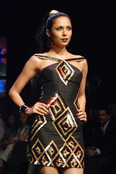 A model wears a creation by designer Malini Ramani at Chivas Regal ...
