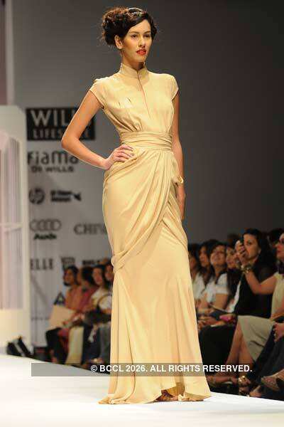 A model displays a creation by designers Gauri and Nainika during the ...