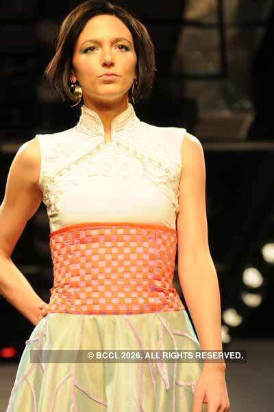 Joey Mathews displays a creation by designer Siddharth Tytler during ...