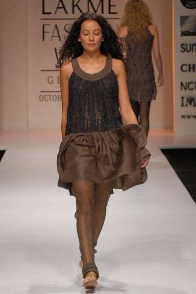A model displays a creation by designer Ruchi Mehta from her collection ...