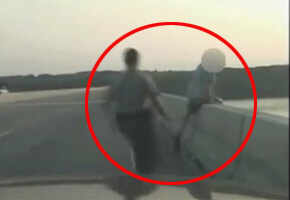 Dramatic video: Officer lunges to rescue bridge jumper
