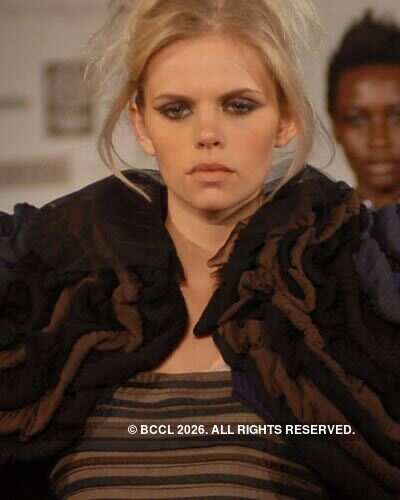 Designer Rohit Bal walks the ramp with models during Day 1 of Delhi ...