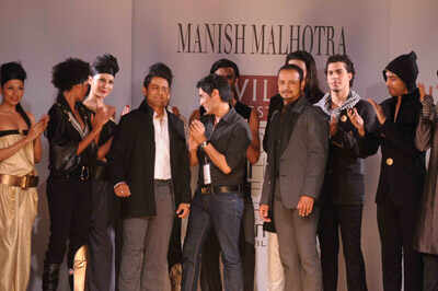 Designer Manish Malhotra on the ramp after his collection was showcased ...