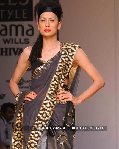 Sonalika Sahay presents a creation by designer Manish Malhotra during ...