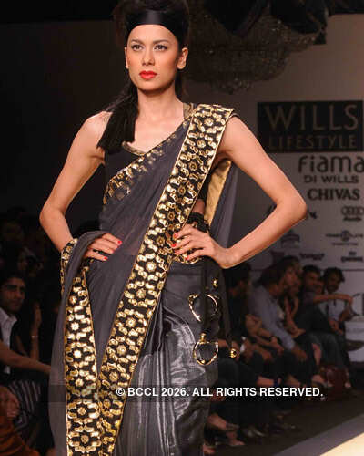 Sonalika Sahay presents a creation by designer Manish Malhotra during ...