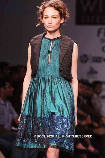 Tina Chatwal presents a creation by designer Niki Mahajan during Day 3 ...