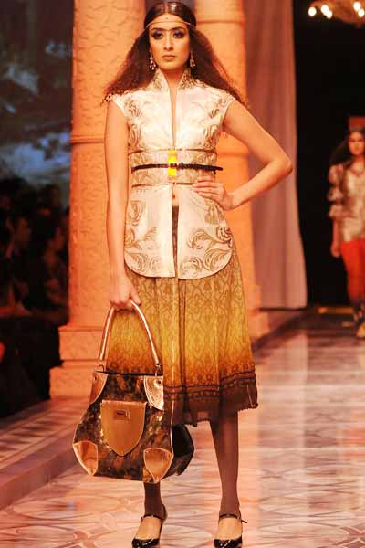 A model presents a creation by designer JJ Valaya during Day 5 of Wills ...