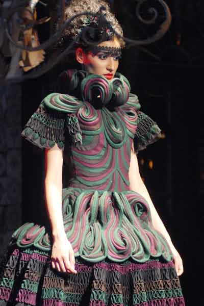 A model presents a creation by designer Rohit Bal during Day 5 of Delhi ...